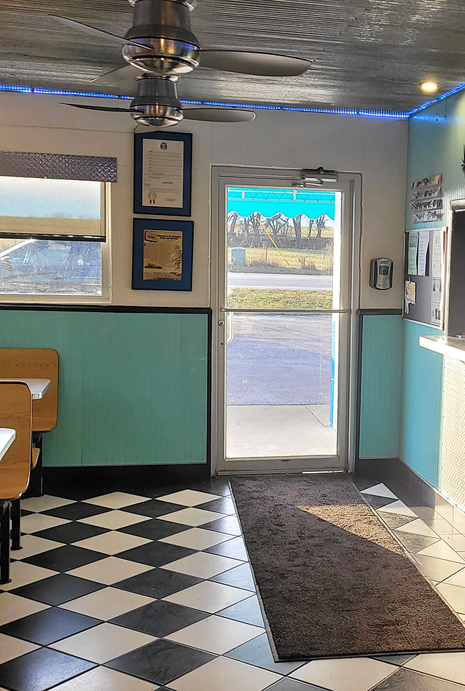 The black-and-white checkered floor leads to the exit, but not before you've experienced a taste of authentic roadside Americana.