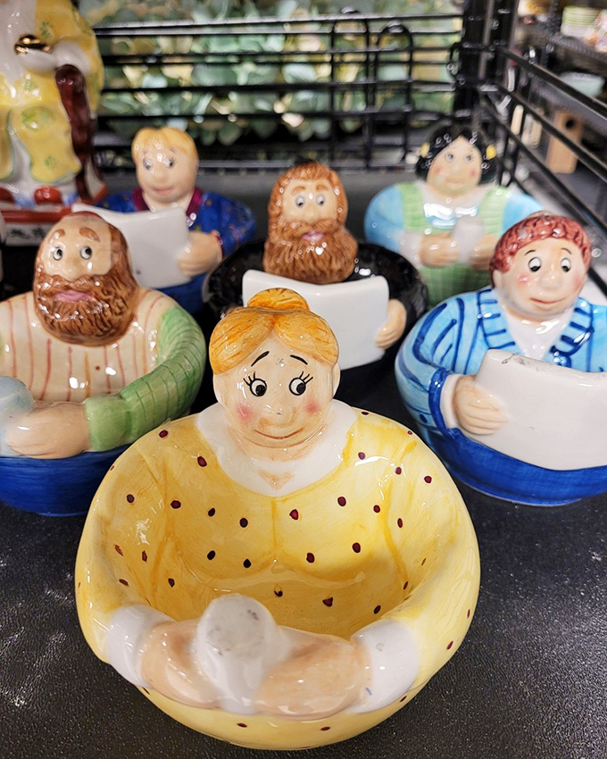 A ceramic committee of characters ready to hold your keys, rings, or simply judge your decorating choices with their permanent smiles.