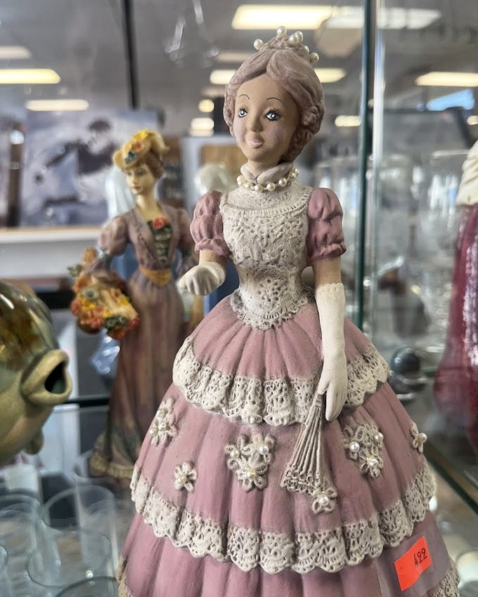 Porcelain figurines with personality to spare. This Victorian lady has been waiting patiently for her forever home.