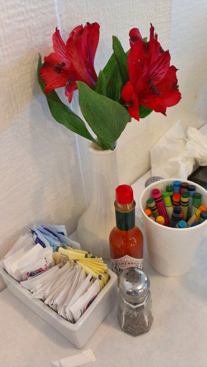 Little touches like fresh flowers and crayons for kids prove someone here understands that dining memories are made from more than just food.