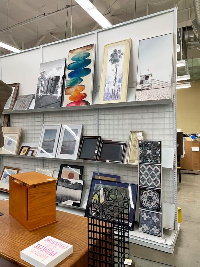 Framed artwork leans against walls, waiting for new homes to showcase someone else's creative vision.