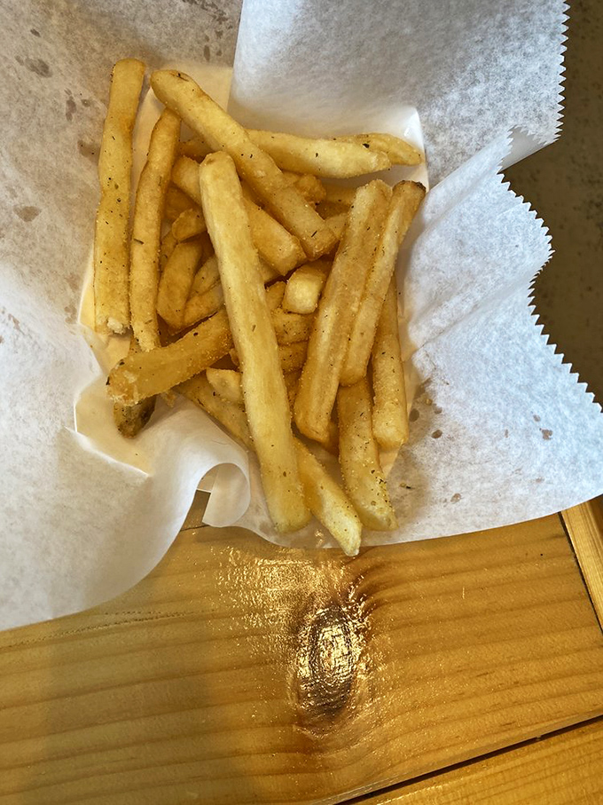 French fries that understand their supporting role&mdash;crispy, well-seasoned, and ready to soak up any stray barbecue sauce.