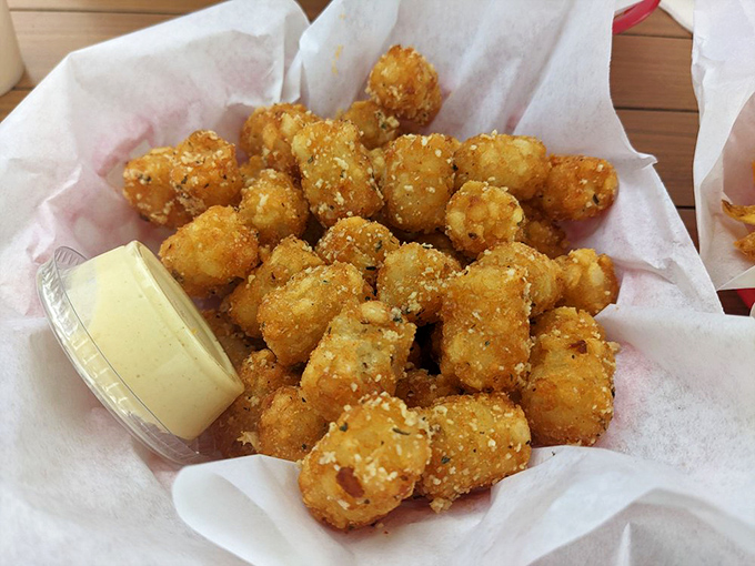These golden-fried garlic tots are like the supporting actor who steals the show&mdash;crispy, punchy little flavor bombs that deserve their own fan club.
