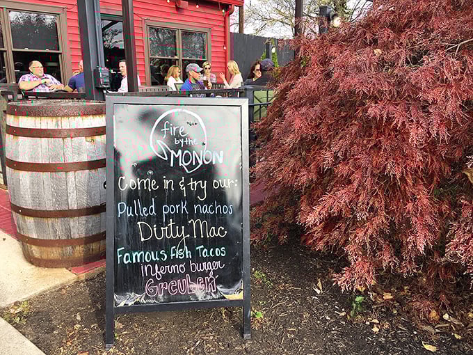 "Come try our pulled pork nachos!" The chalkboard sign makes promises your taste buds will thank you for keeping.