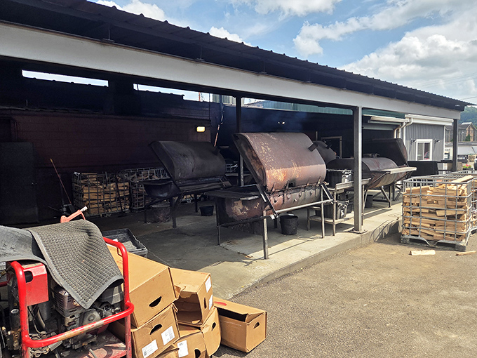 The outdoor command center where meat magic happens, rain or shine, because dedication doesn't take weather days.