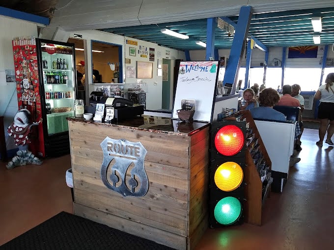 Inside, Route 66 memorabilia and a traffic light remind you that sometimes the journey's best moments happen when you stop.