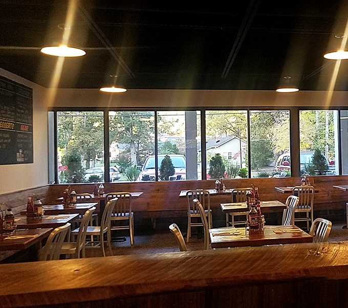 Sunlight streams through windows illuminating wooden tables that have witnessed countless "mmms" and "oh my goodnesses" from satisfied customers. Barbecue church is in session.