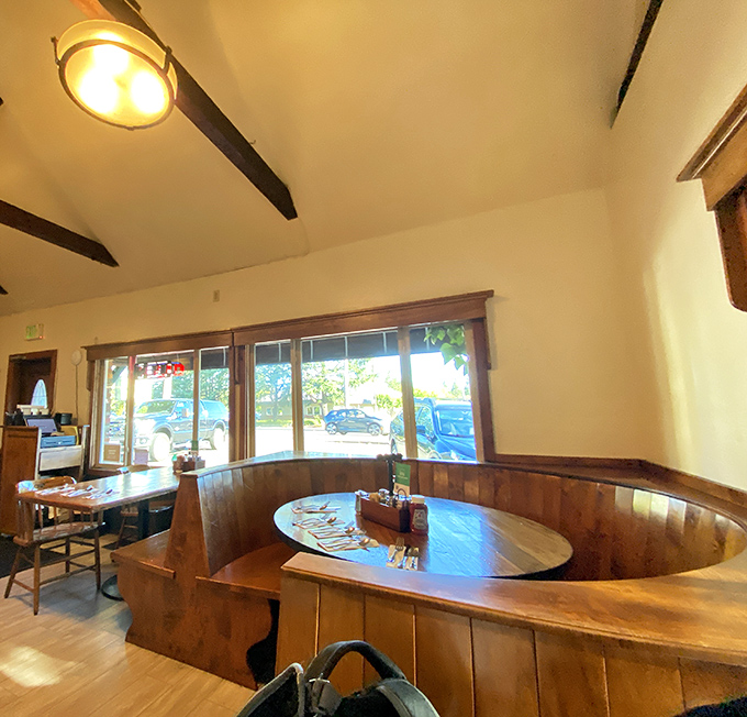 Wooden booths bathed in natural light &ndash; the perfect setting for morning conversations or contemplative solo dining with the newspaper.