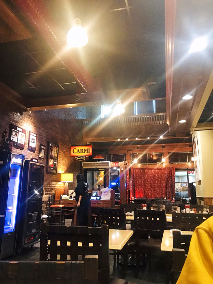 The dining room's warm glow and rustic charm create the perfect backdrop for meals that feel like celebrations, even on ordinary Tuesdays.