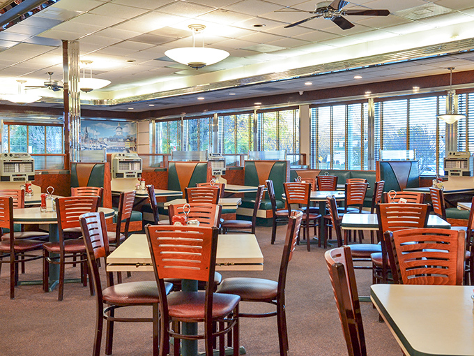 The dining room stretches out like a sea of possibilities, each table a potential stage for the drama of good eating.