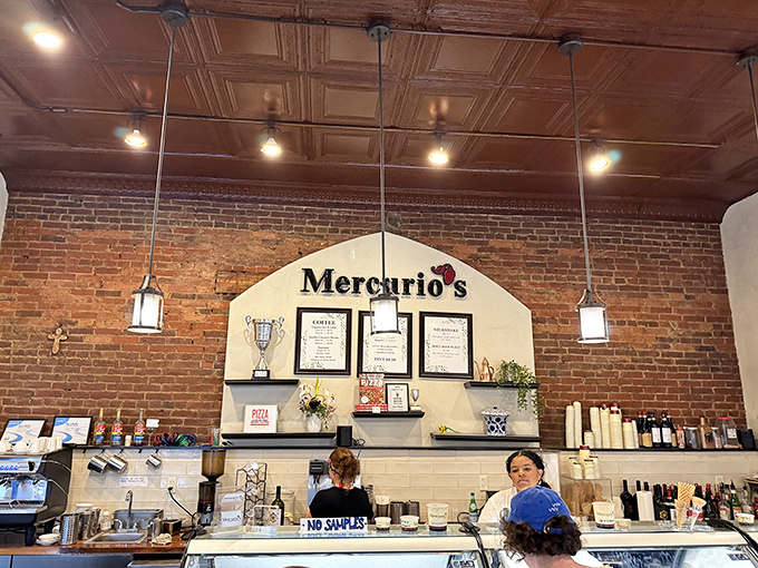 The counter area showcases both their craft and credentials. Those pendant lights aren't just illuminating the space—they're spotlighting culinary artistry.