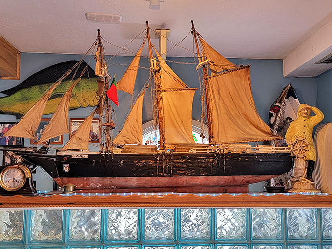 Maritime history decorates the walls with model ships and fishing memorabilia. It's like dining inside a charming seaside museum where you can eat the exhibits.