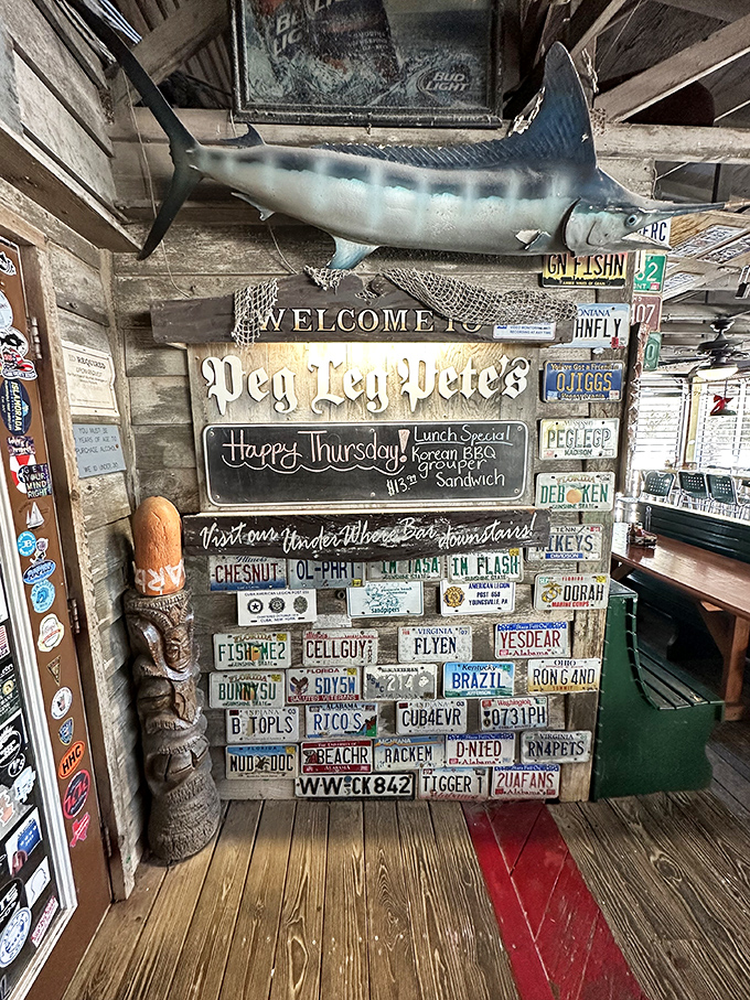License plates from across America tell the story&mdash;people will drive ridiculous distances just to eat here. The marlin overhead silently agrees.