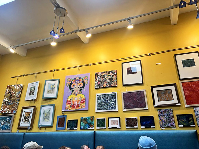 Gallery-worthy local art transforms a simple meal into a cultural experience. Yellow walls create sunshine even on Cleveland's grayest days.