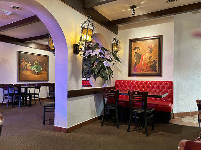Wrought iron lanterns cast a warm glow over red booths and Mexican artwork&mdash;transporting you south of the border without leaving Michigan.
