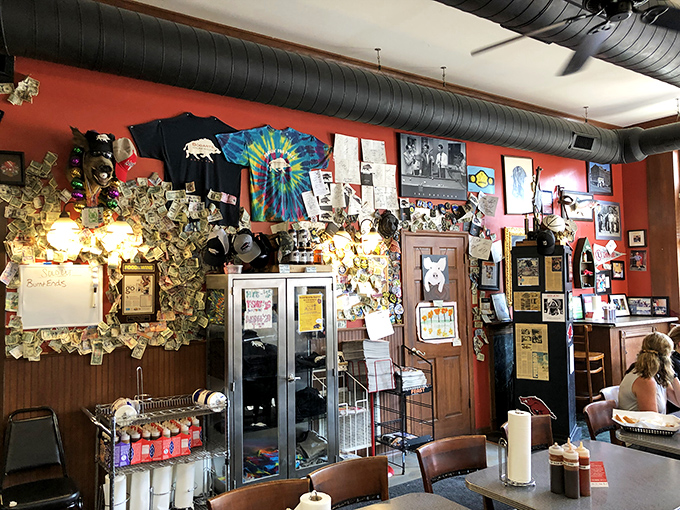 The walls tell stories of BBQ triumphs past. Each dollar bill and photo is a testament to someone who couldn't keep their joy to themselves.
