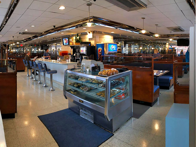 The counter and booths await like old friends, promising conversations, coffee refills, and zero judgment.