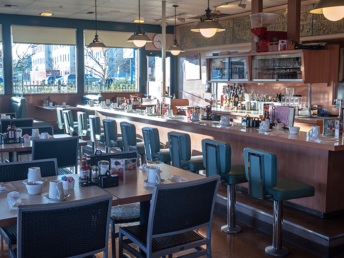 Counter seating: where solo diners become family and the coffee refills come with a side of local wisdom.