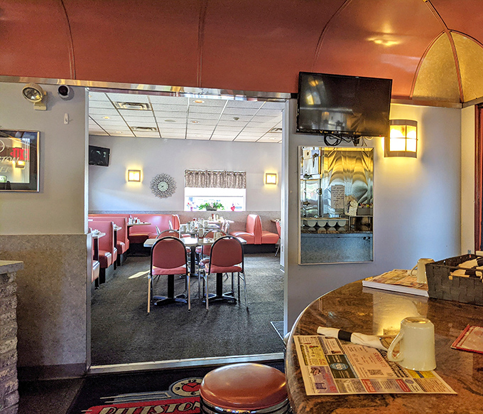 Pink booths and chrome tables&mdash;not just furniture, but time machines to when conversations happened face-to-face and phones were just for calling.