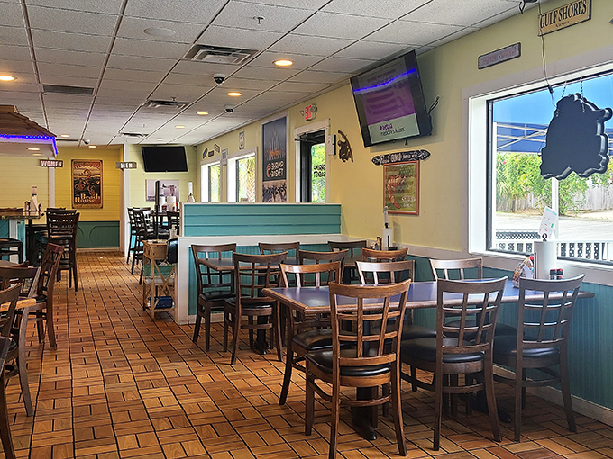 The dining room where calories don't count and seafood dreams come true. Yellow walls and teal accents set the coastal mood.