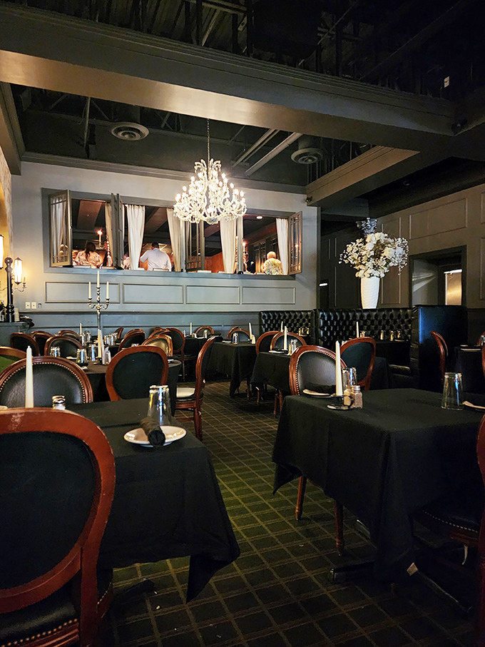 Crystal chandeliers and elegant table settings create an atmosphere where you half expect James Bond to walk in and order something shaken.