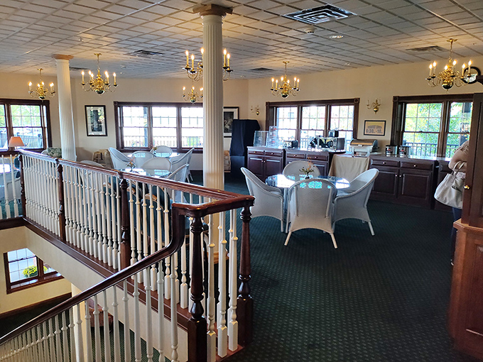 Elegant dining upstairs provides a more intimate setting. Those chandeliers and white tablecloths say "special occasion" even when it's just Tuesday.