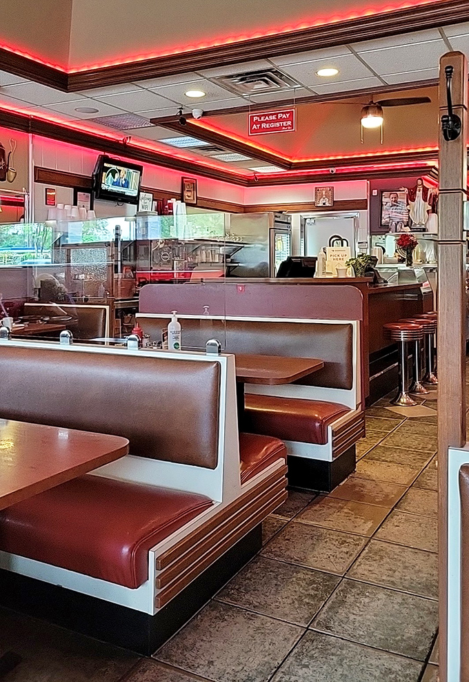 The classic diner layout perfected: booths designed for lingering conversations, with just enough privacy to feel like your own little dining room.