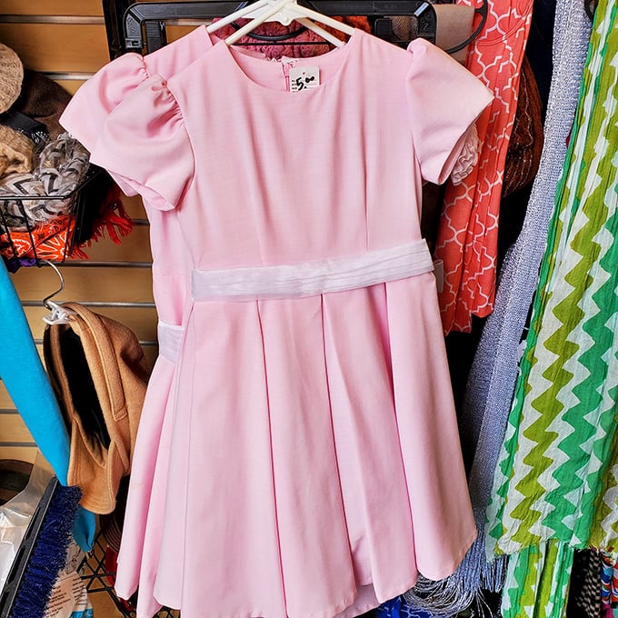 Pretty in pink! This child's dress proves that special occasion outfits don't need to break the bank when they'll be outgrown in months.