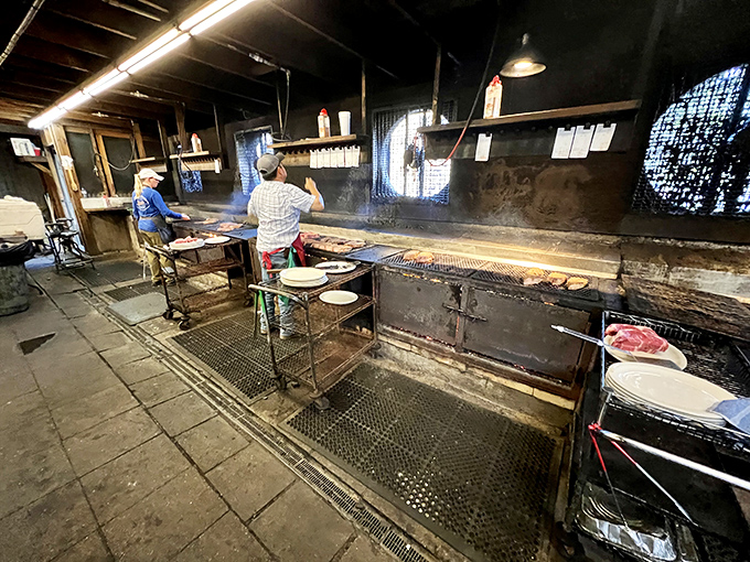 The kitchen crew works their magic on a grill that's seen more action than a John Wayne movie.