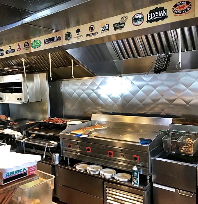 That lineup of craft beer logos above the kitchen isn't just decoration&mdash;it's a promise that your meal comes with proper liquid companionship.