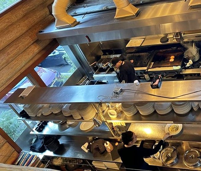 Where the magic happens. The gleaming kitchen offers a glimpse into the orchestrated chaos that produces those plate-licking-good meals you'll dream about later.