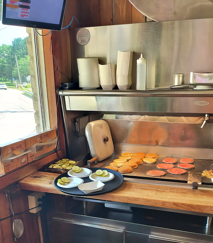 Where the magic happens &ndash; patties hitting the flat-top with that satisfying sizzle that promises deliciousness is just minutes away.