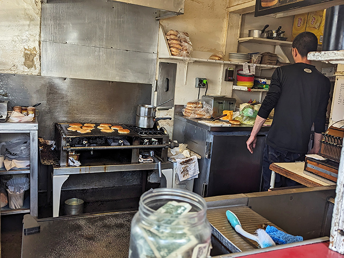 This kitchen may be small, but like a well-choreographed dance, every movement has purpose and every inch of space earns its keep.