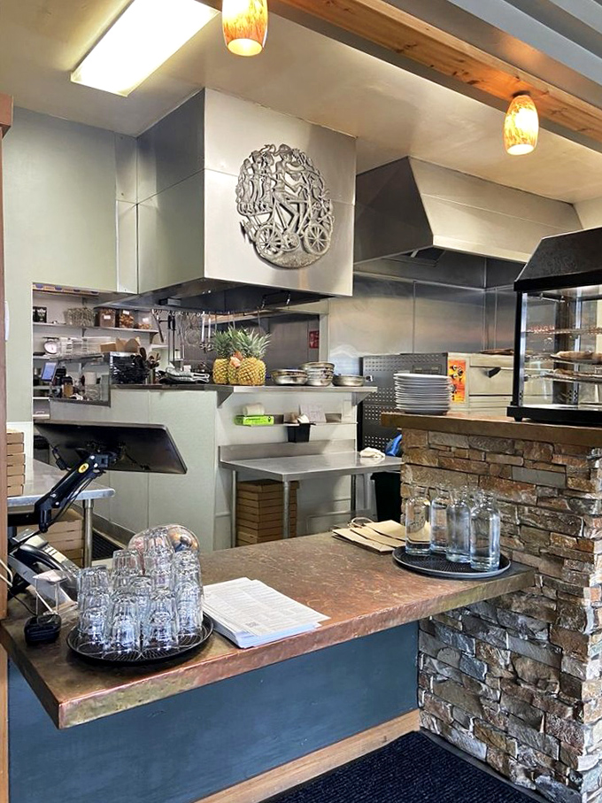 The kitchen command center – where pizza dreams become delicious reality through stainless steel and stone.