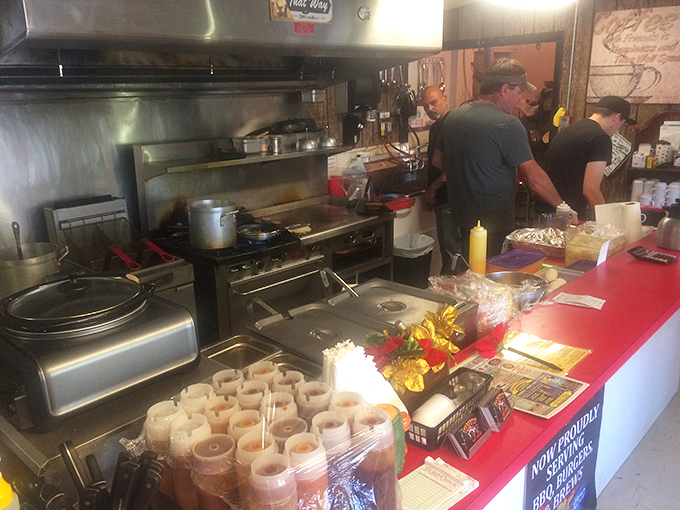 Where the magic happens. This kitchen may not be fancy, but those hands know exactly what they're doing with meat and fire.