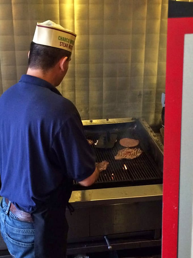 Behind every great steak is someone in a paper hat who knows exactly what they're doing. Culinary magic happens at that grill.