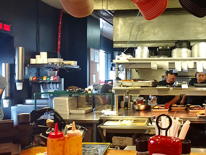 A glimpse into the kitchen where the magic happens&mdash;bottles of sauce standing at attention, ready for their supporting role in your meal.