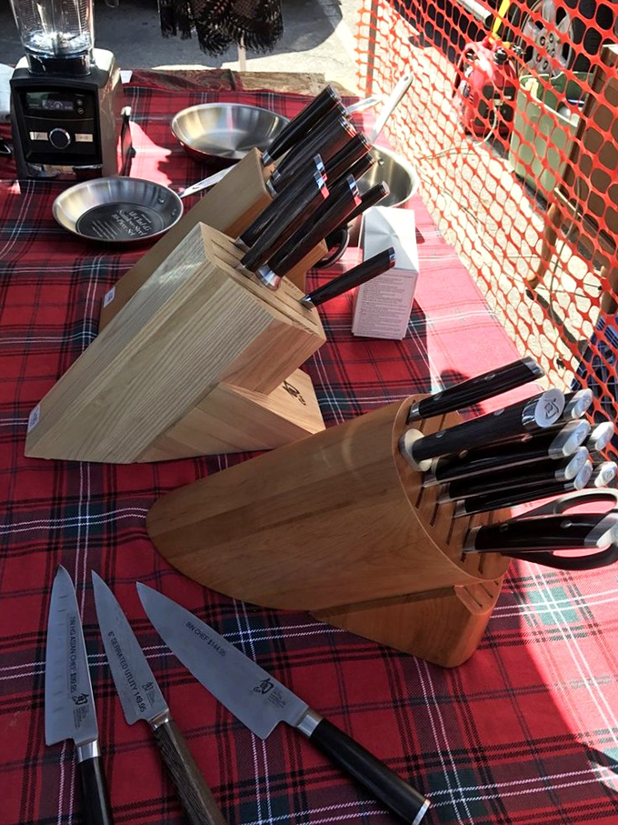 Chef-worthy knife sets displayed on classic plaid. These blades have stories to tell&mdash;and many more meals to prepare in their second-chance kitchens.