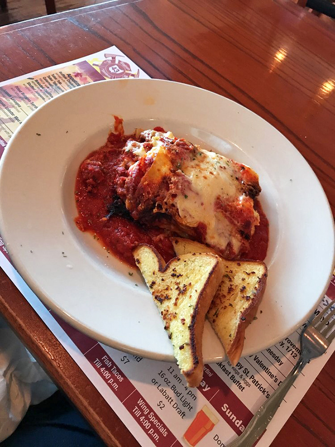 This isn't just lasagna&mdash;it's layers of comfort and tradition, where the cheese pull should be measured in feet, not inches.