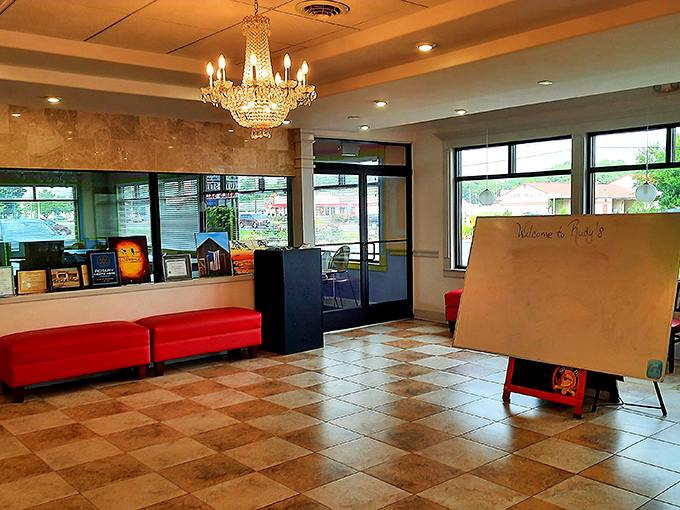 A welcoming entrance that whispers "come as you are" while that chandelier adds just enough fancy to feel special.