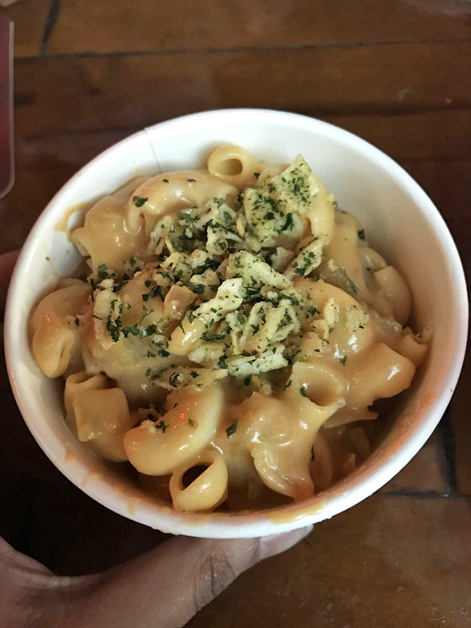 This mac and cheese isn't trying to reinvent comfort &ndash; it's perfecting it with a creamy sauce that clings to each pasta curve like it's found home.