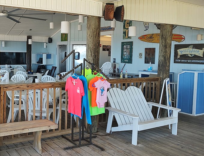 Colorful shirts swaying in the sea breeze, Adirondack bench inviting a post-meal moment. Some souvenirs you wear, others you just remember.