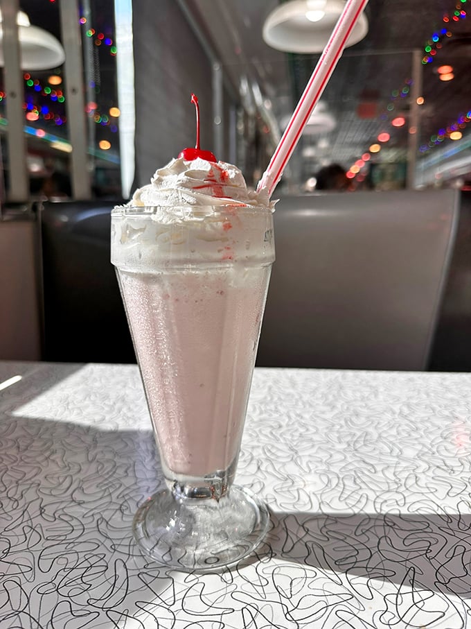 This isn't just a milkshake&mdash;it's a frothy monument to indulgence, topped with enough whipped cream to make your cardiologist weep.
