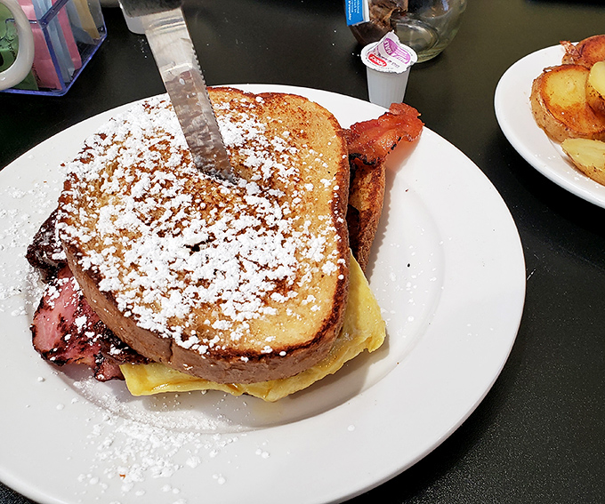 The Monte Cristo – where French toast meets sandwich in a powdered sugar dusted romance that makes breakfast jealous of lunch.