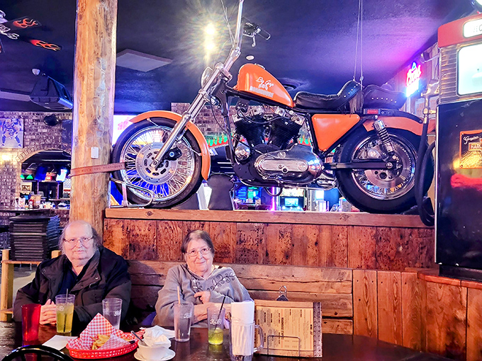 A vintage motorcycle watches over diners like a mechanical guardian angel. In Wisconsin, roadhouse decor isn't just decoration&mdash;it's cultural heritage.