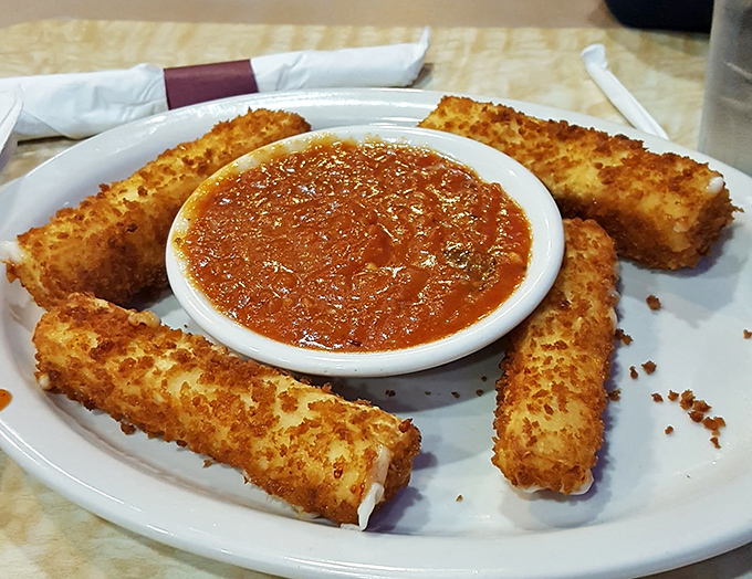 Mozzarella sticks: where cheese gets dressed in its Sunday best before taking a dip in marinara heaven.