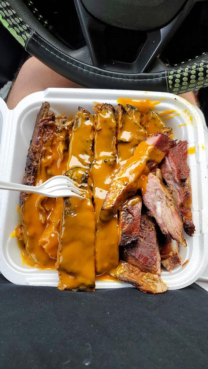 Car dining at its finest. When BBQ sauce on your steering wheel is a badge of honor, not an inconvenience.