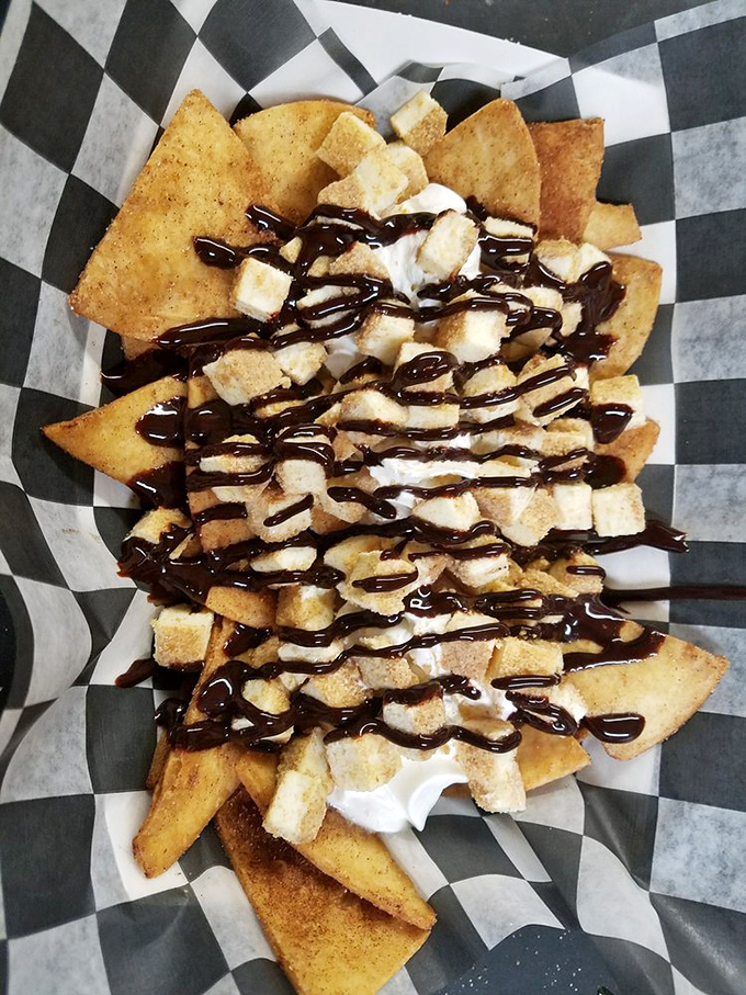 Sweet meets savory in this dessert nacho creation. Whoever first thought "let's drizzle chocolate over chips" deserves a Nobel Prize.