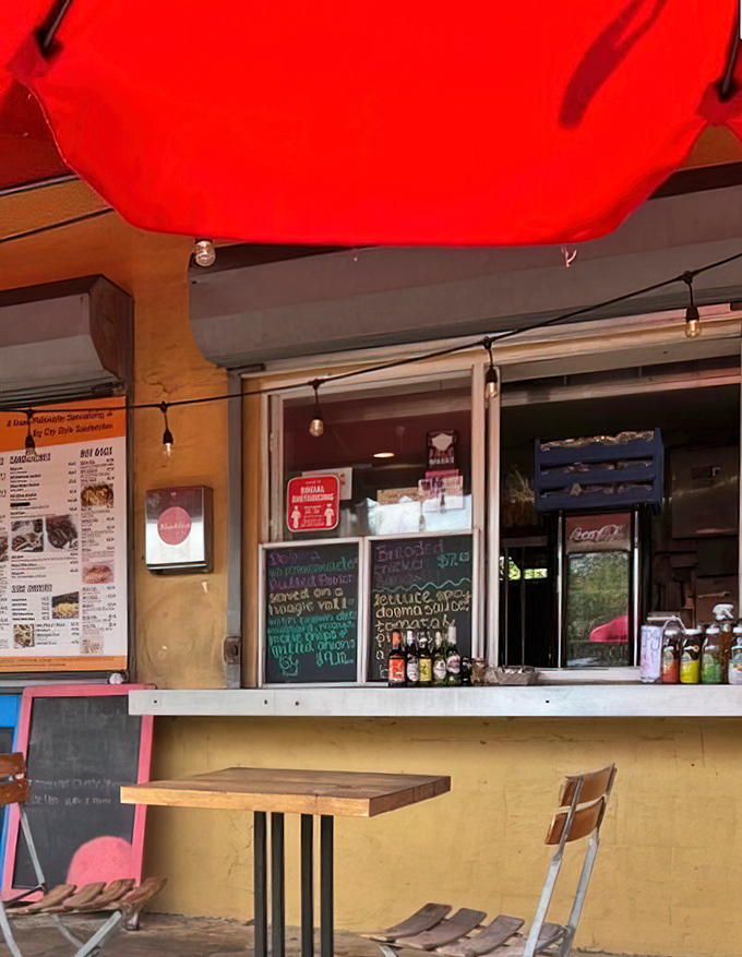 Where dreams and orders are placed. The ordering window at Dogma is like a portal to a world where calories don't count and joy is served fresh.