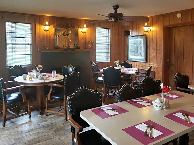 Leather chairs and pink placemats create a dining room that's both rustic and refined &ndash; like your favorite uncle who unexpectedly appreciates fine wine.